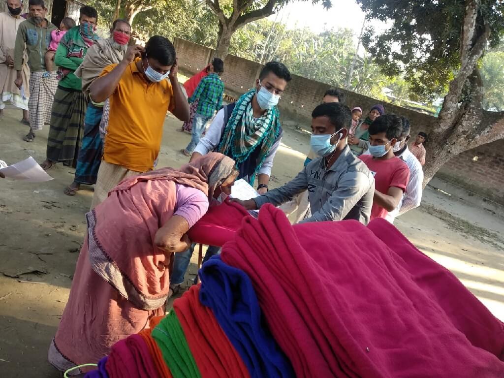 Warm Clothes and Blankets Distribution Program (Part # 13) | Aims ...